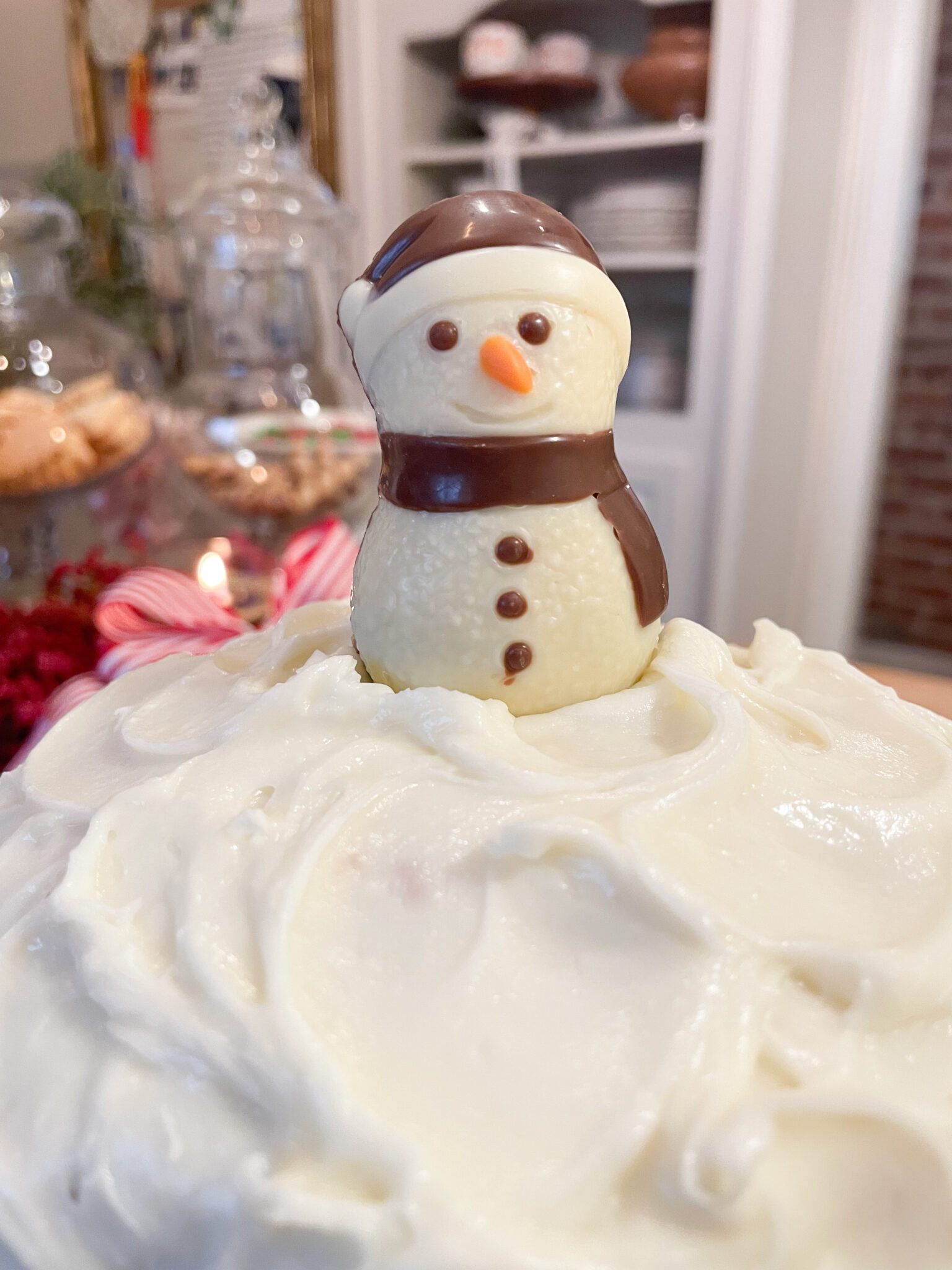 A cocoa bomb cake topper is a delicious dessert decoration!