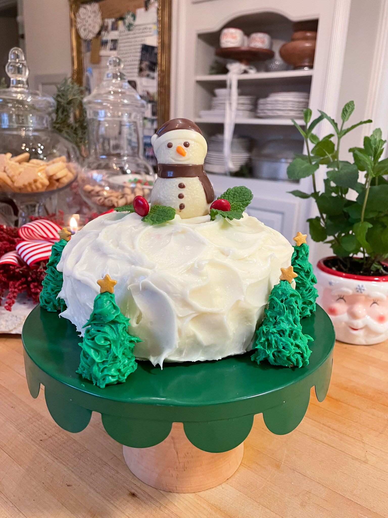 A cocoa bomb cake topper is a delicious dessert decoration!